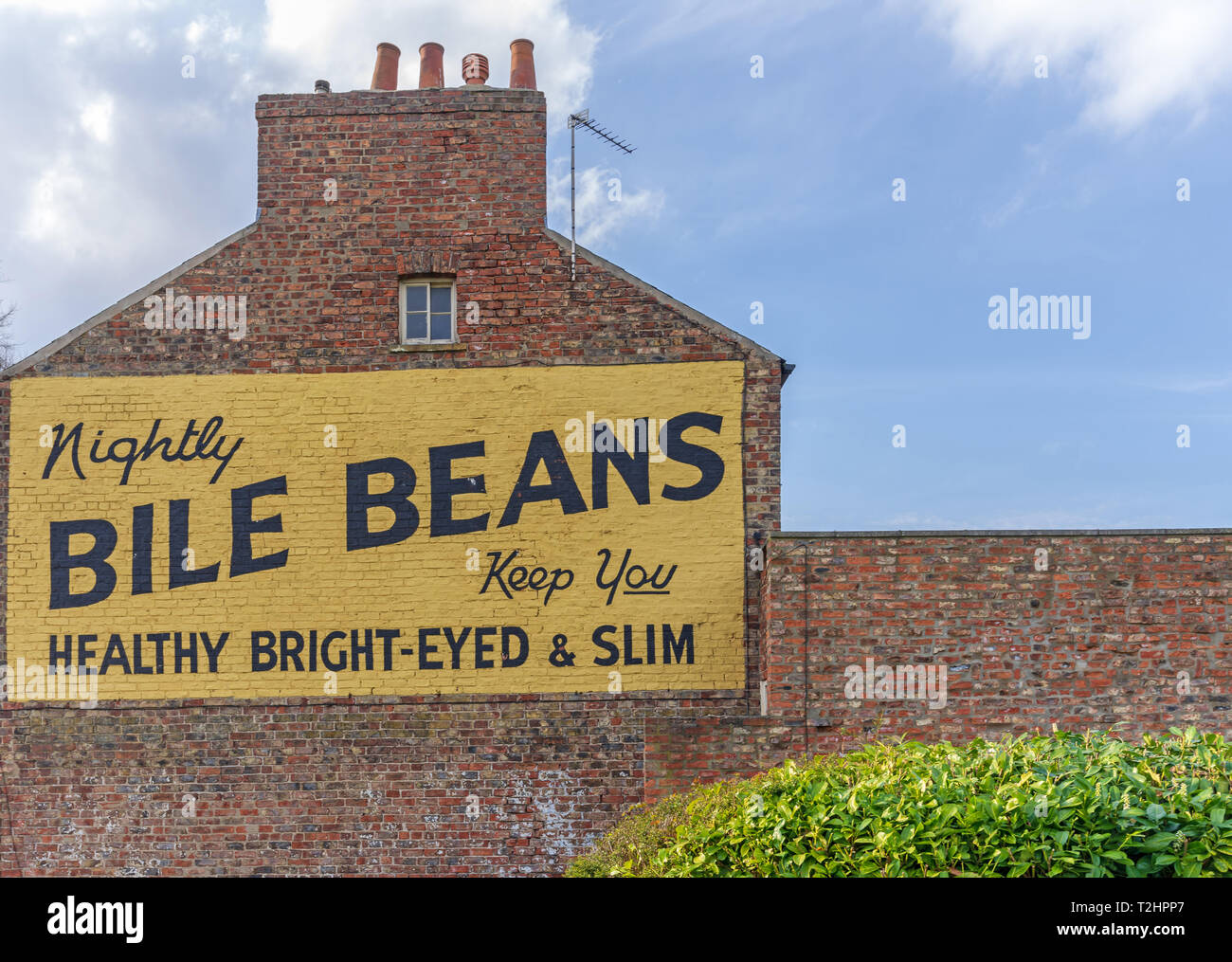 The famous pre-1940 Bile Beans advertisement in York. The painted sign ...