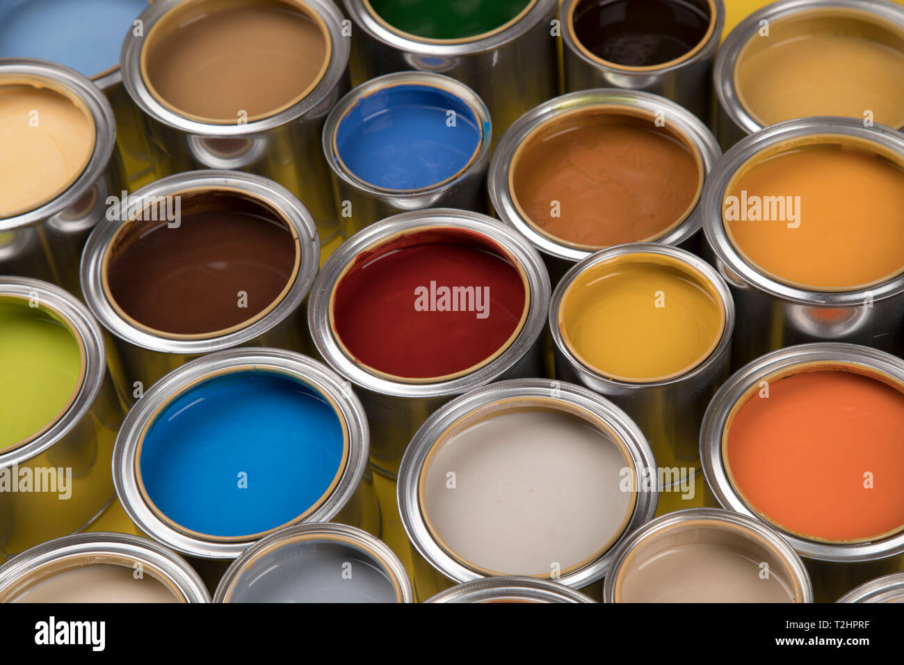 Paint cans color palette, yellow background Stock Photo - Alamy