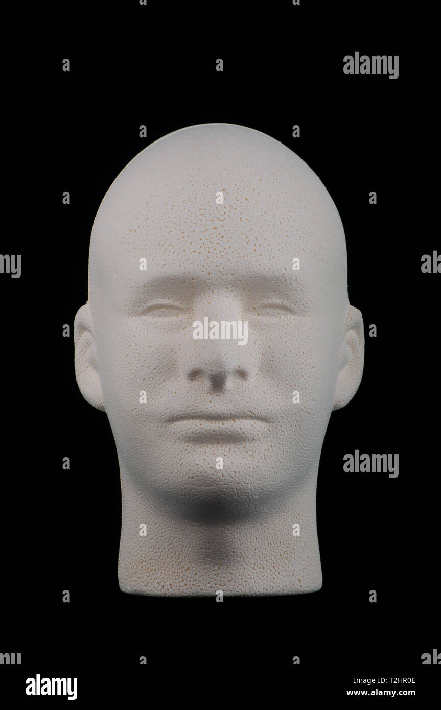 front portrait of white mannequin head with black background Stock ...