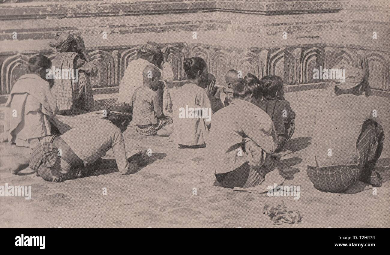 Group of Devotees in a Temple Stock Photo - Alamy