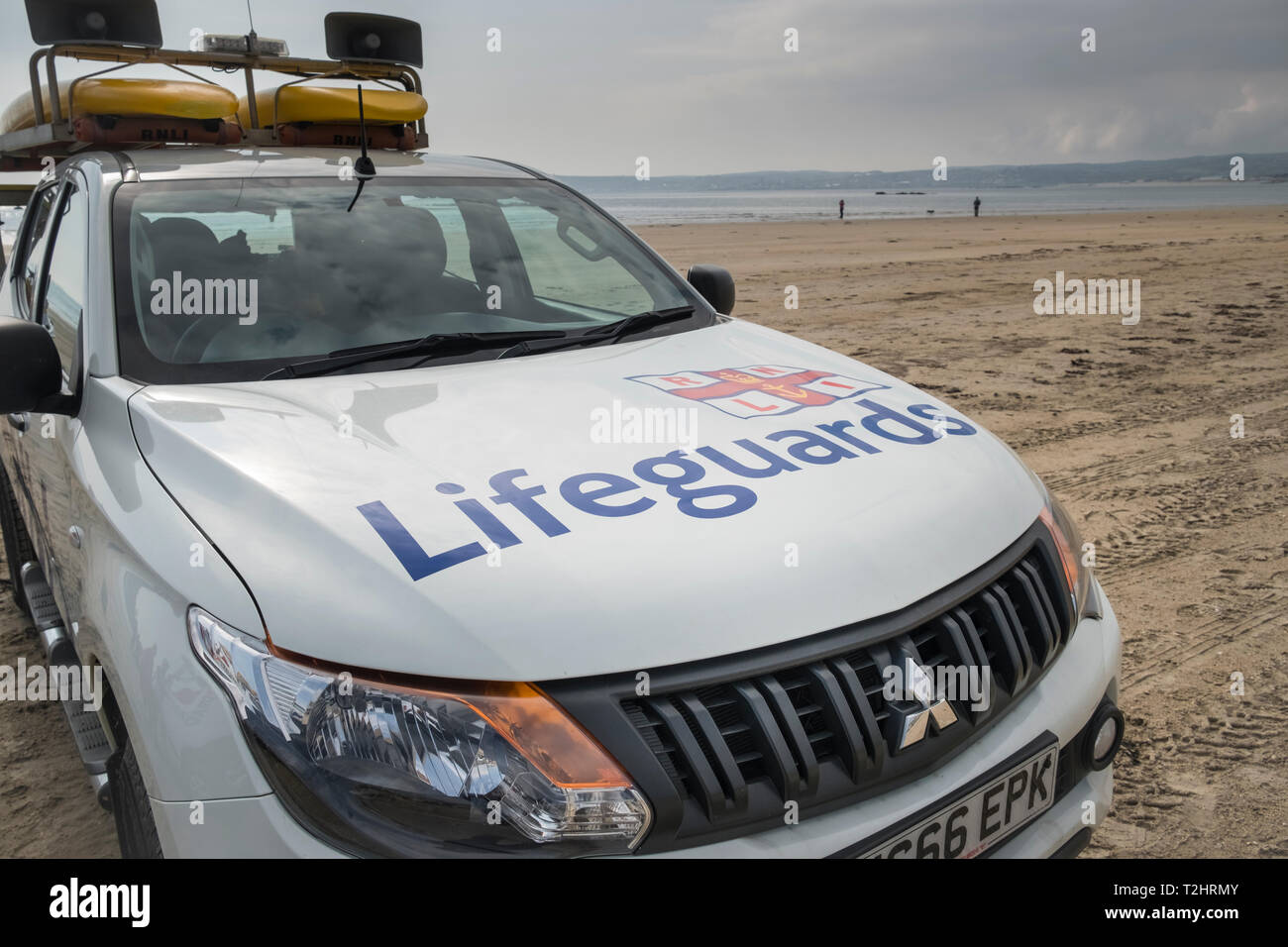 RNLI Lifeguards vehicle on beach, Cornwall, England, UK Stock Photo - Alamy