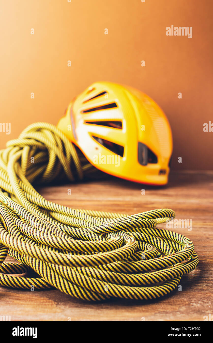 Equipment for high-altitude climbing helmet sports rope on a brown ...