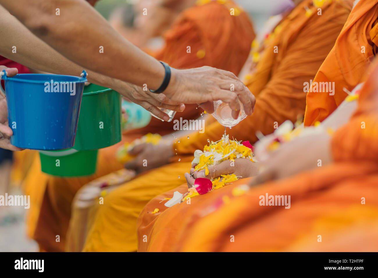 Hands pouring blessing water hi-res stock photography and images - Alamy