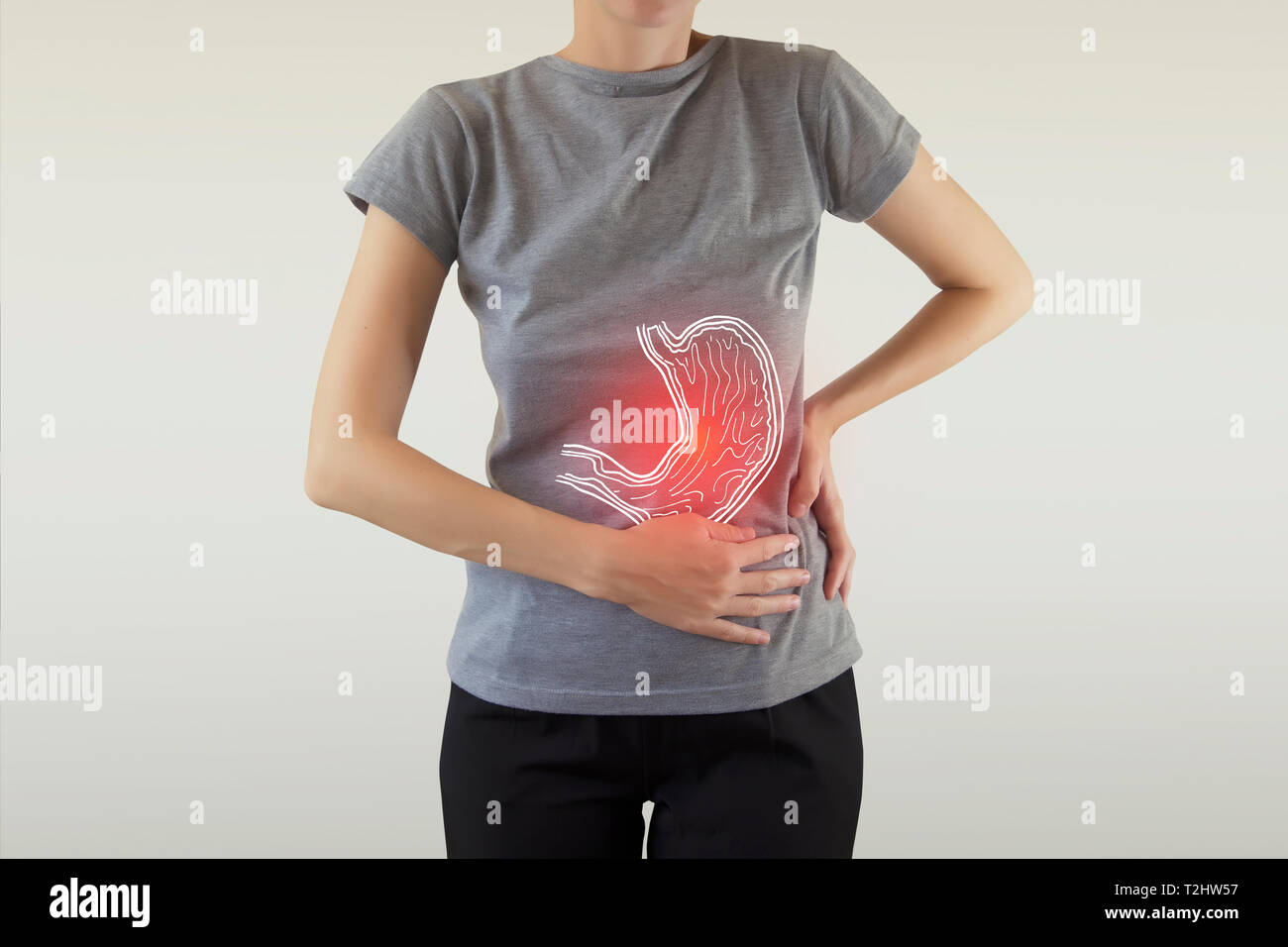 Digital composite of highlighted red pain stomach of woman Stock Photo ...
