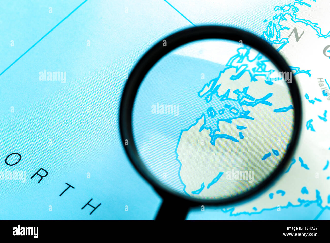 Magnifying glass and map Stock Photo - Alamy