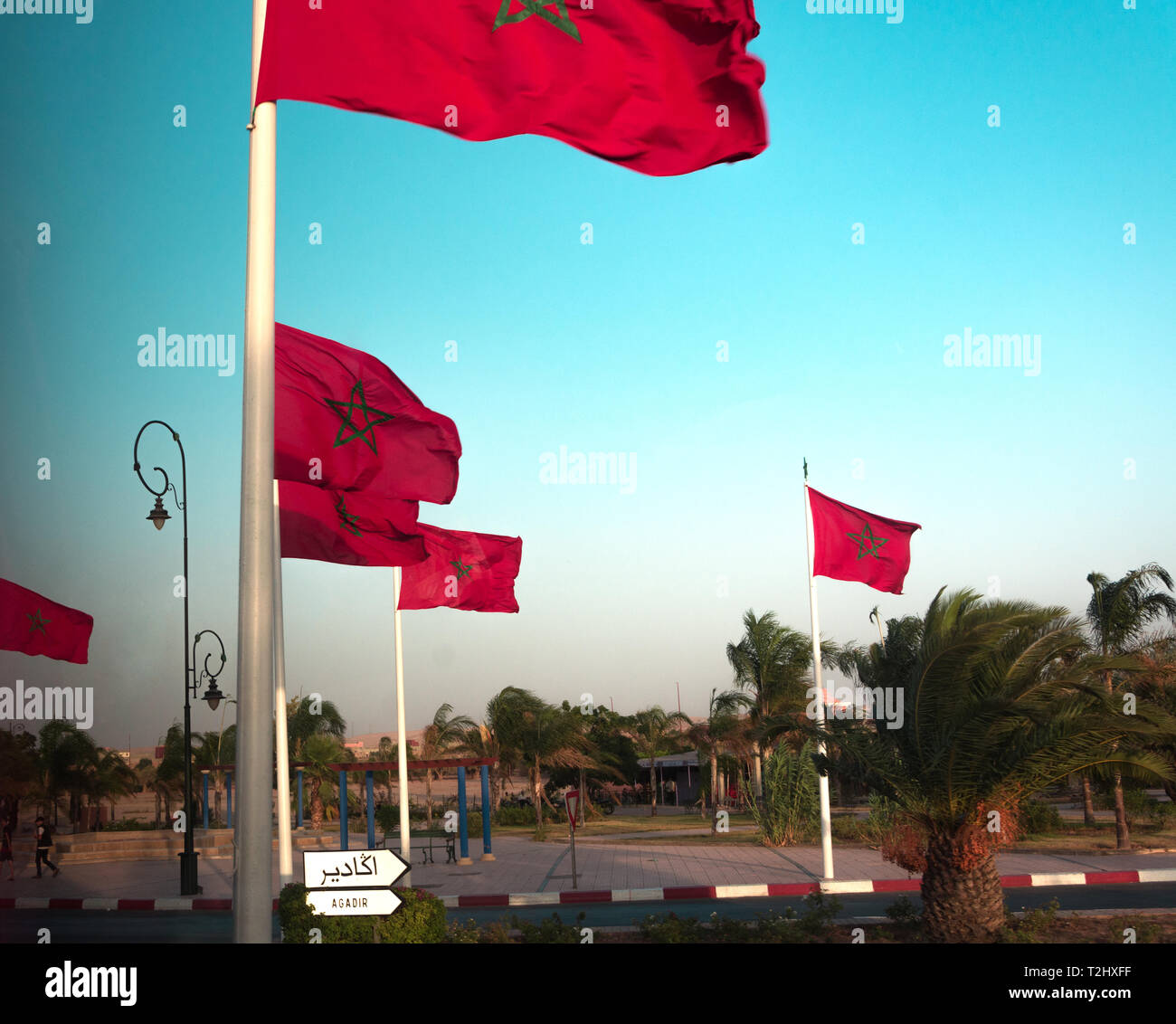morocco flags on blue sky background Stock Photo - Alamy