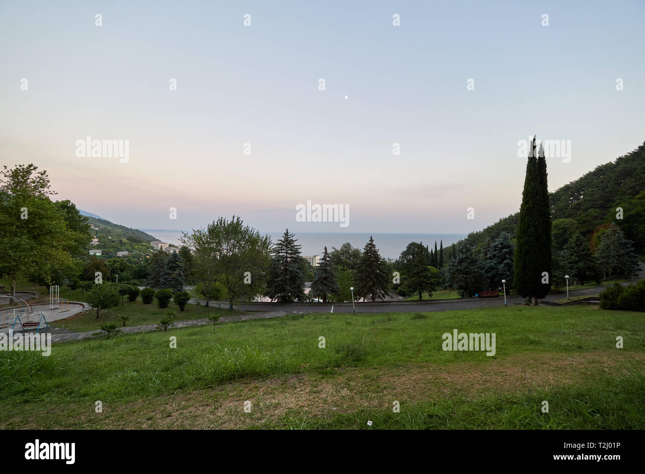 View of the seacoast with residential buildings from the old park ...