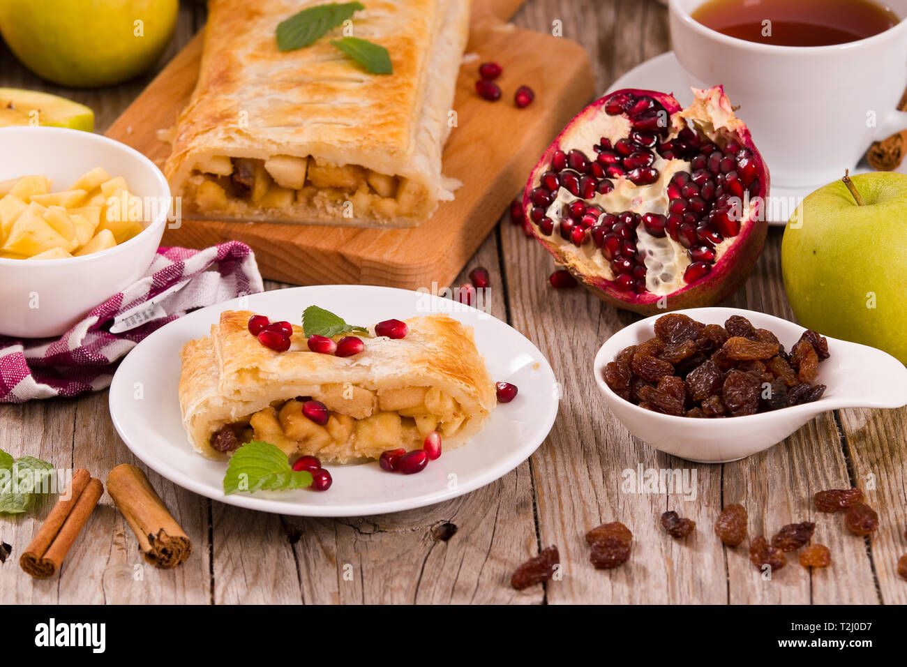 Apple strudel with pomegranate hi-res stock photography and images - Alamy