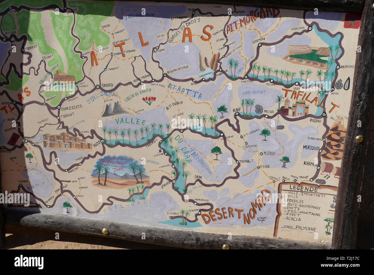 RISSANI, MOROCCO - FEB 15, 2019 - Painted map of the Moroccan Sahara ...