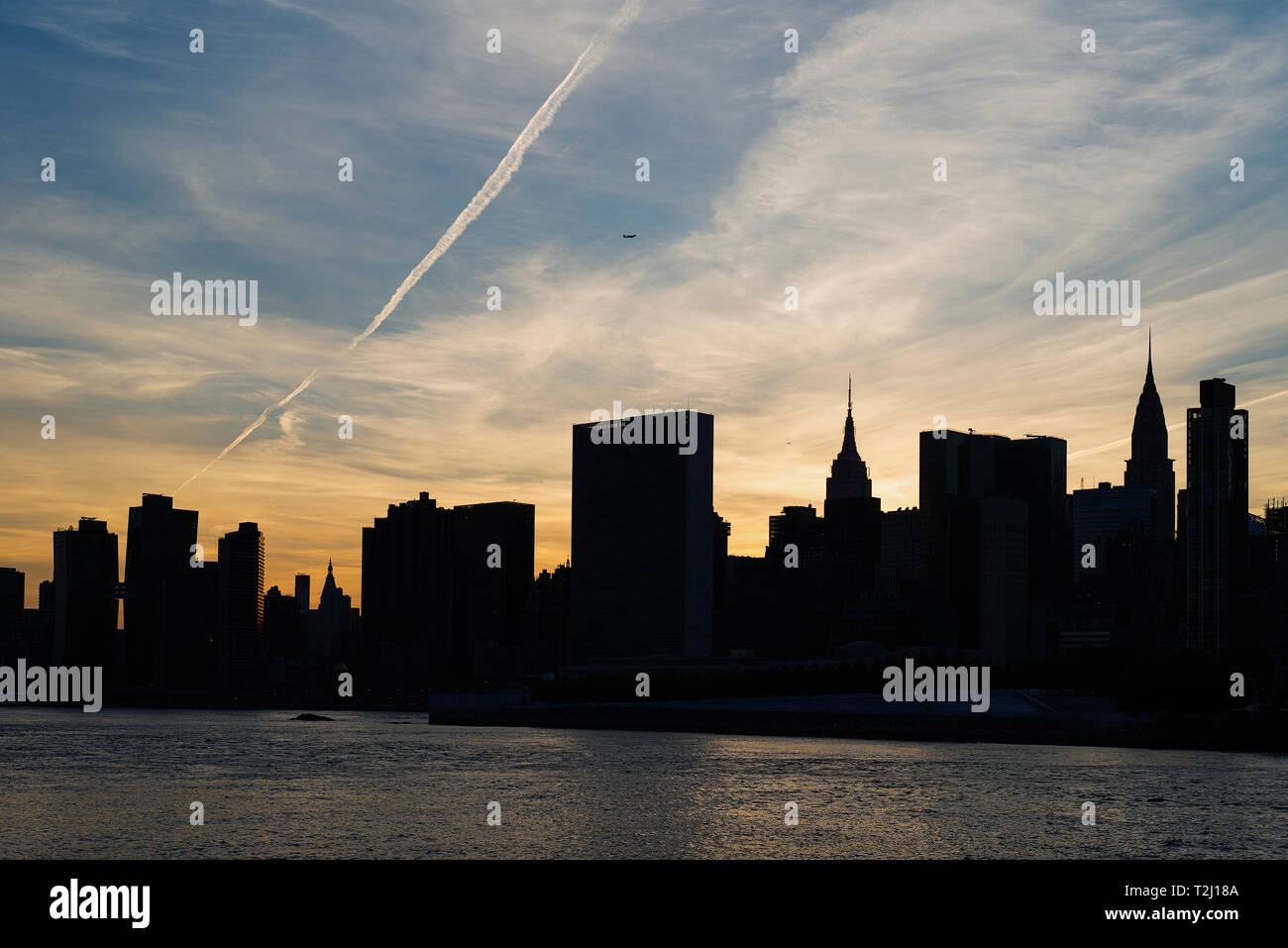 The sunset over Manhattan, New York, USA Stock Photo - Alamy