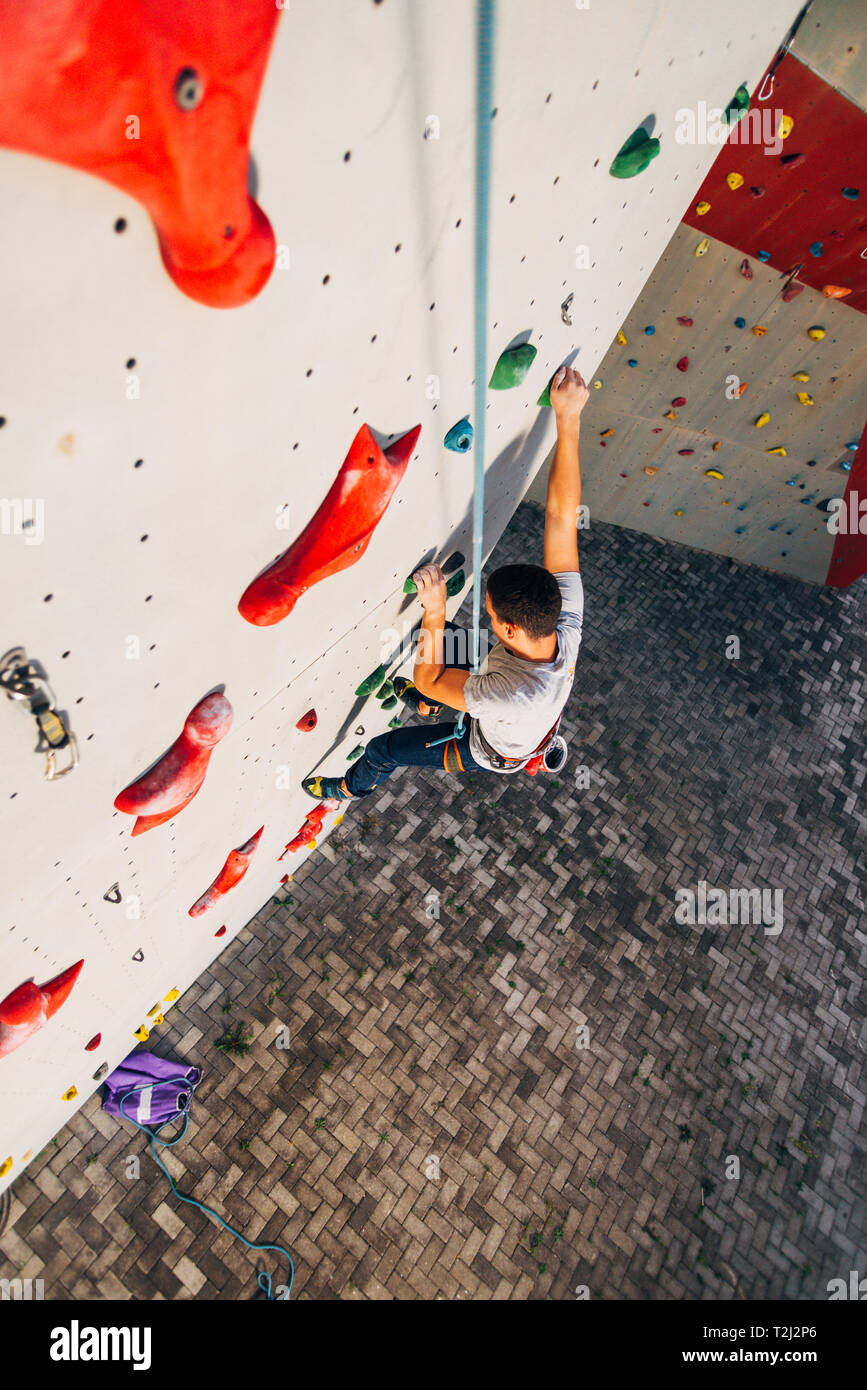 Active lifestyle and bouldering climbing, reaching the top concept ...