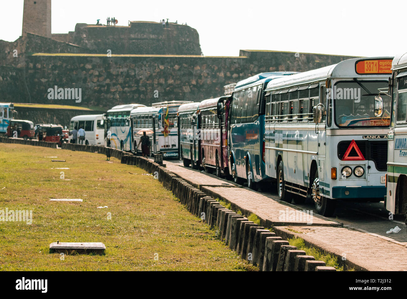 Galle, Sri Lanka - February 18th, 2019: Queue of public buses at the ...