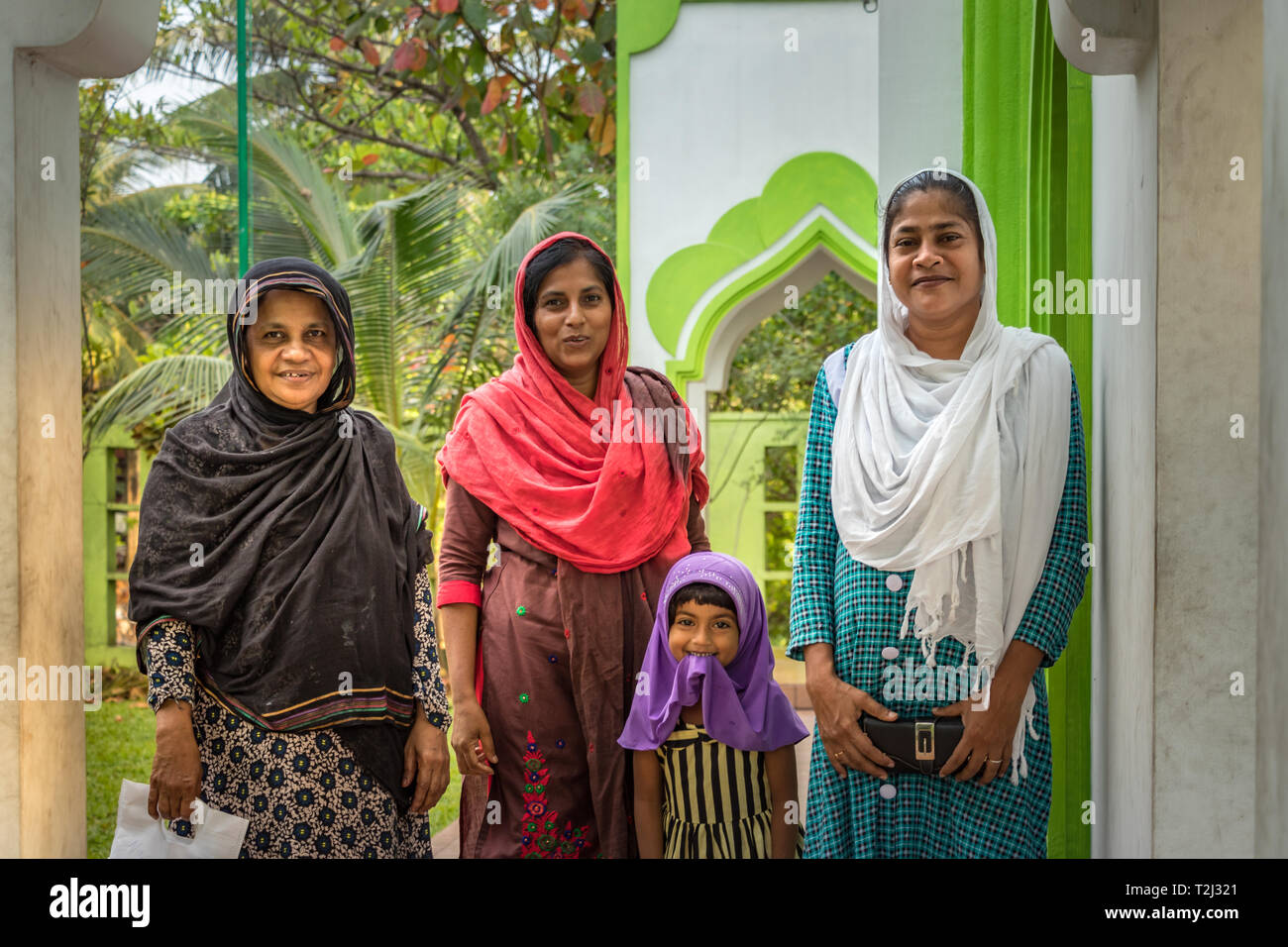 Galle, Sri Lanka - February 17th, 2019: Three women and a girl wearing ...