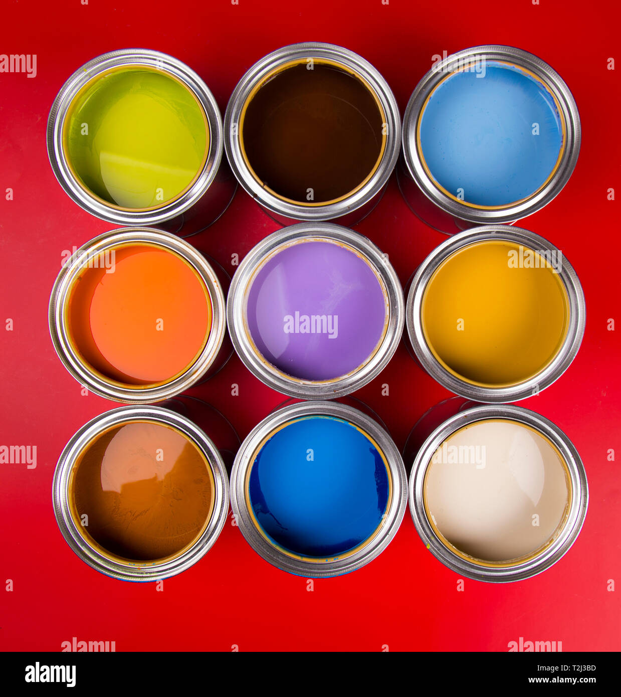 Paint cans color palette, red background Stock Photo - Alamy