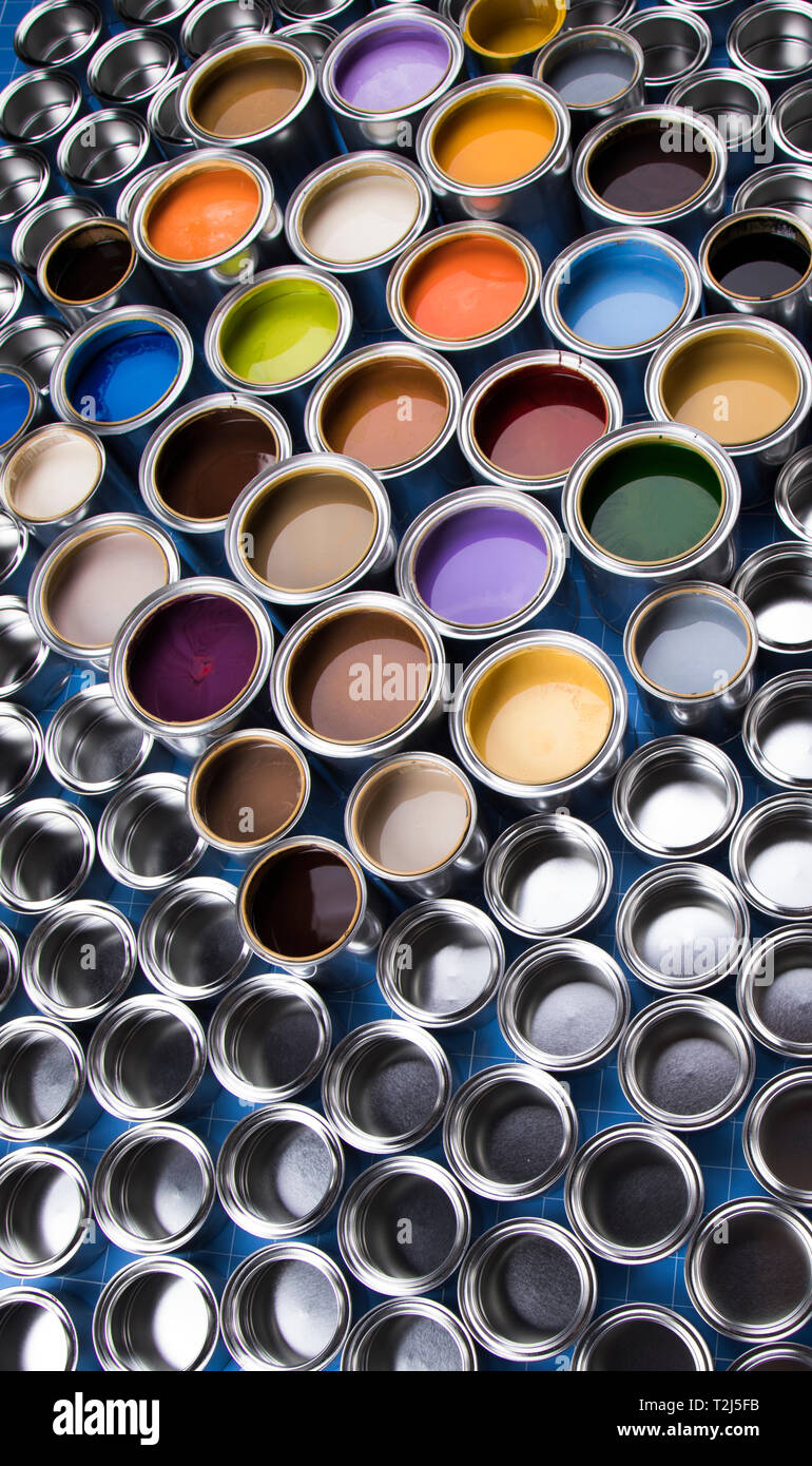 Metal cans with color paint Stock Photo - Alamy