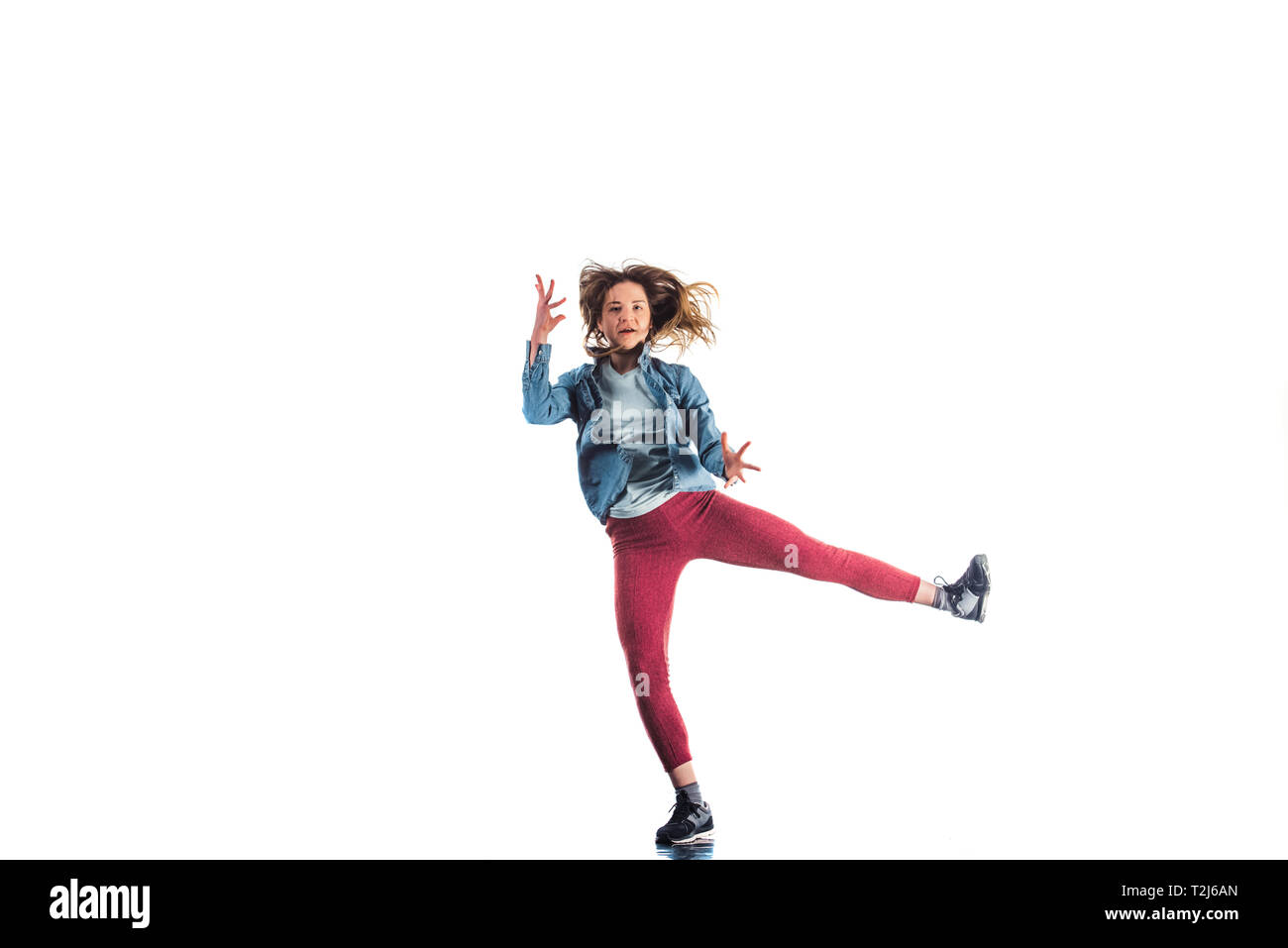 An urban girl is doing breakdance isolated on white background Stock ...