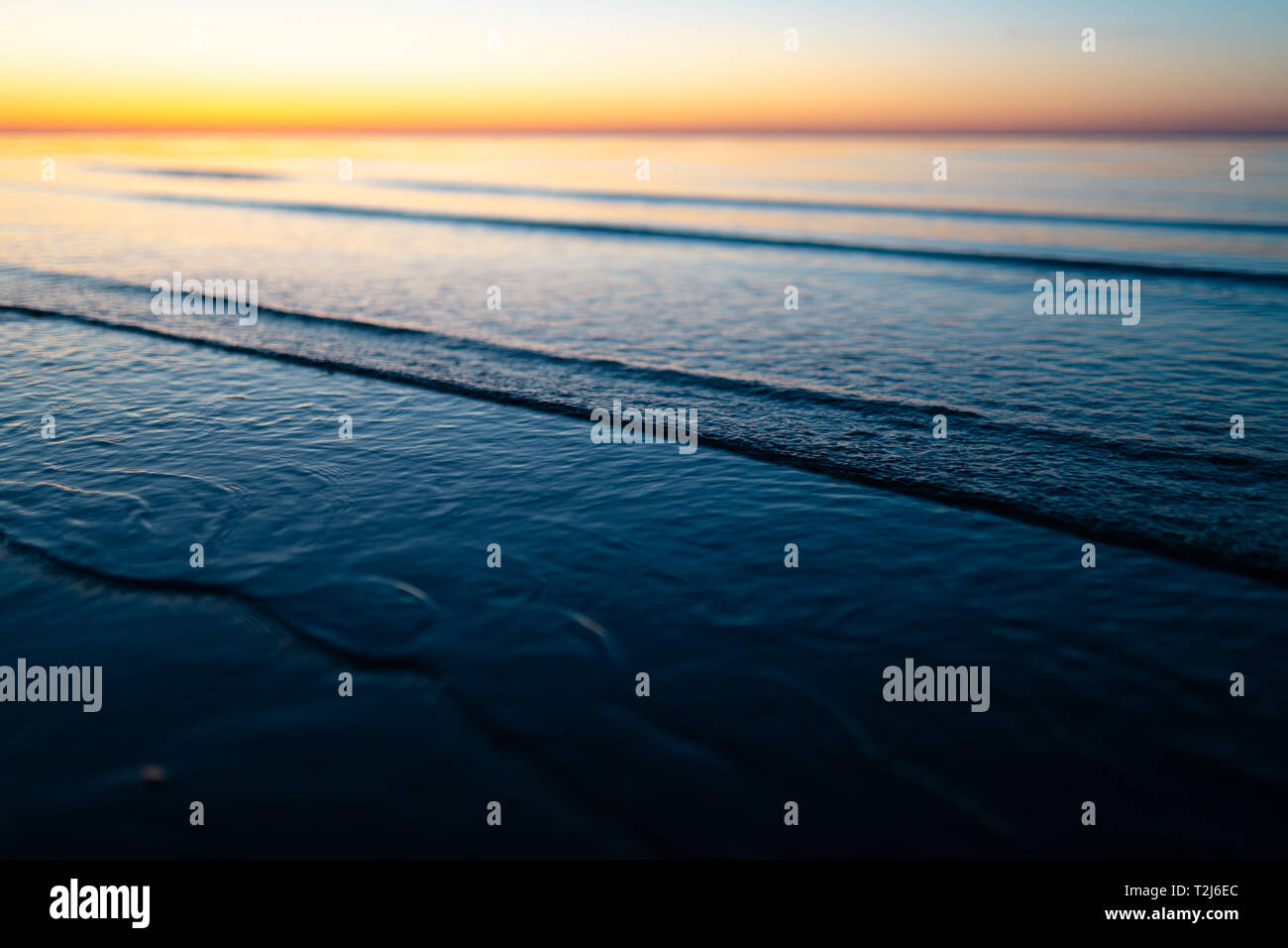 Vivid amazing sunset in Baltic States - Dusk in the sea with horizon ...