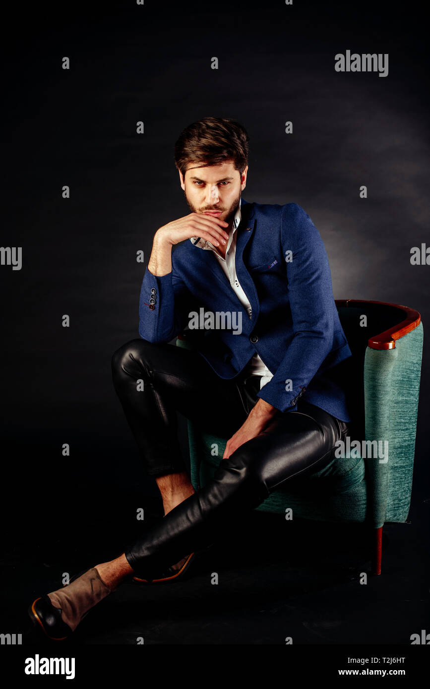 Portrait of serious stylish man in blue suit looking front of him Stock ...