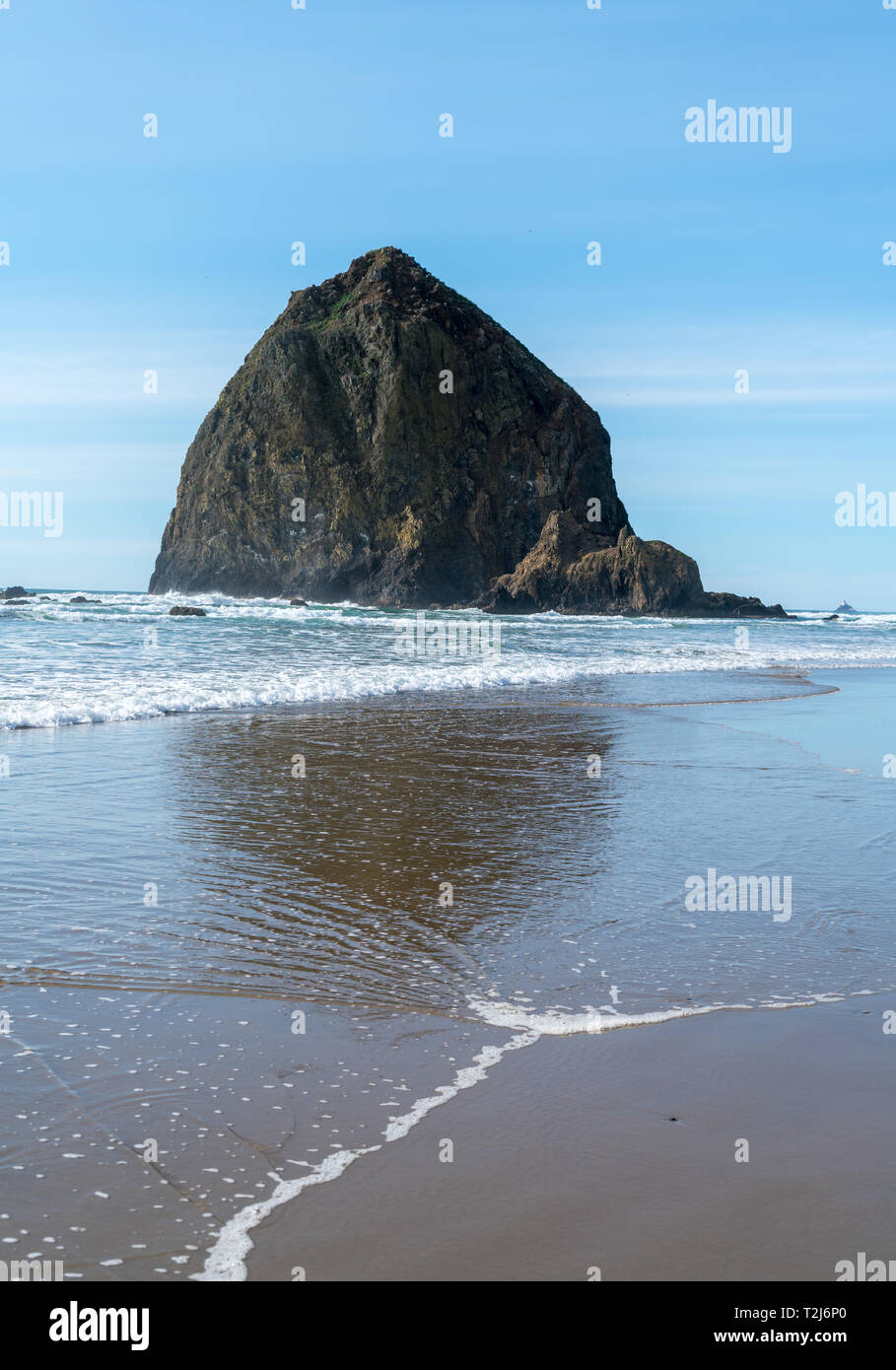 Portrait View of Large Rock Formation in the Beach Stock Photo - Alamy