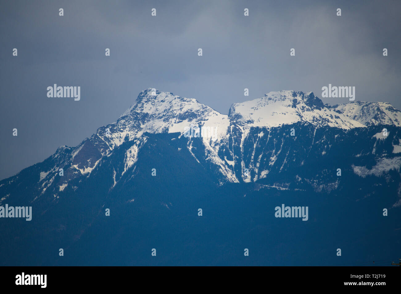 Mountains of the British Columbia coast range overlook farms in the ...