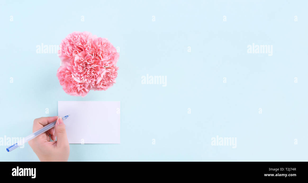 Handwritten greeting card by young teenage person isolated with pale ...