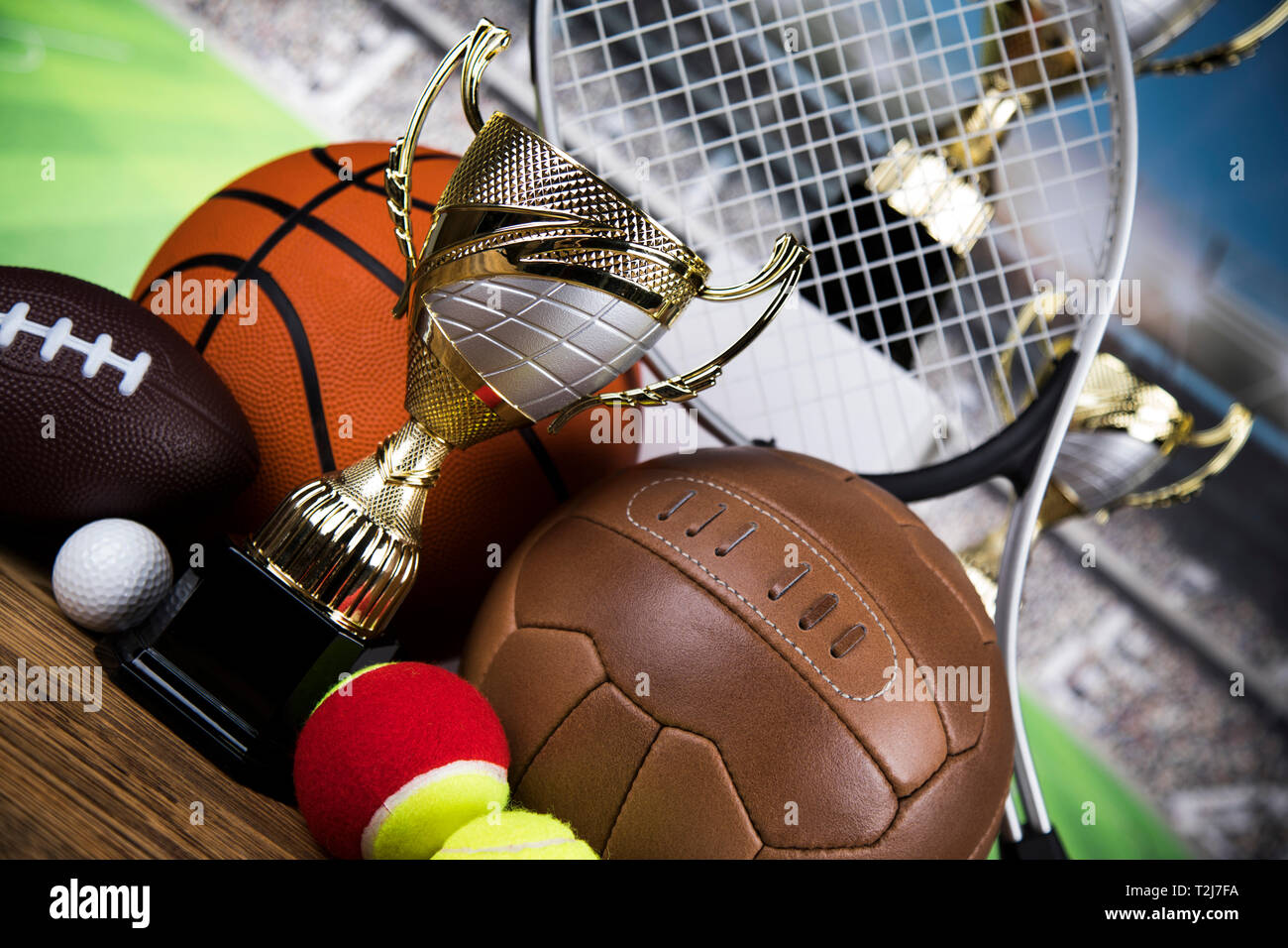 Winner trophy, Sport equipment and balls Stock Photo - Alamy