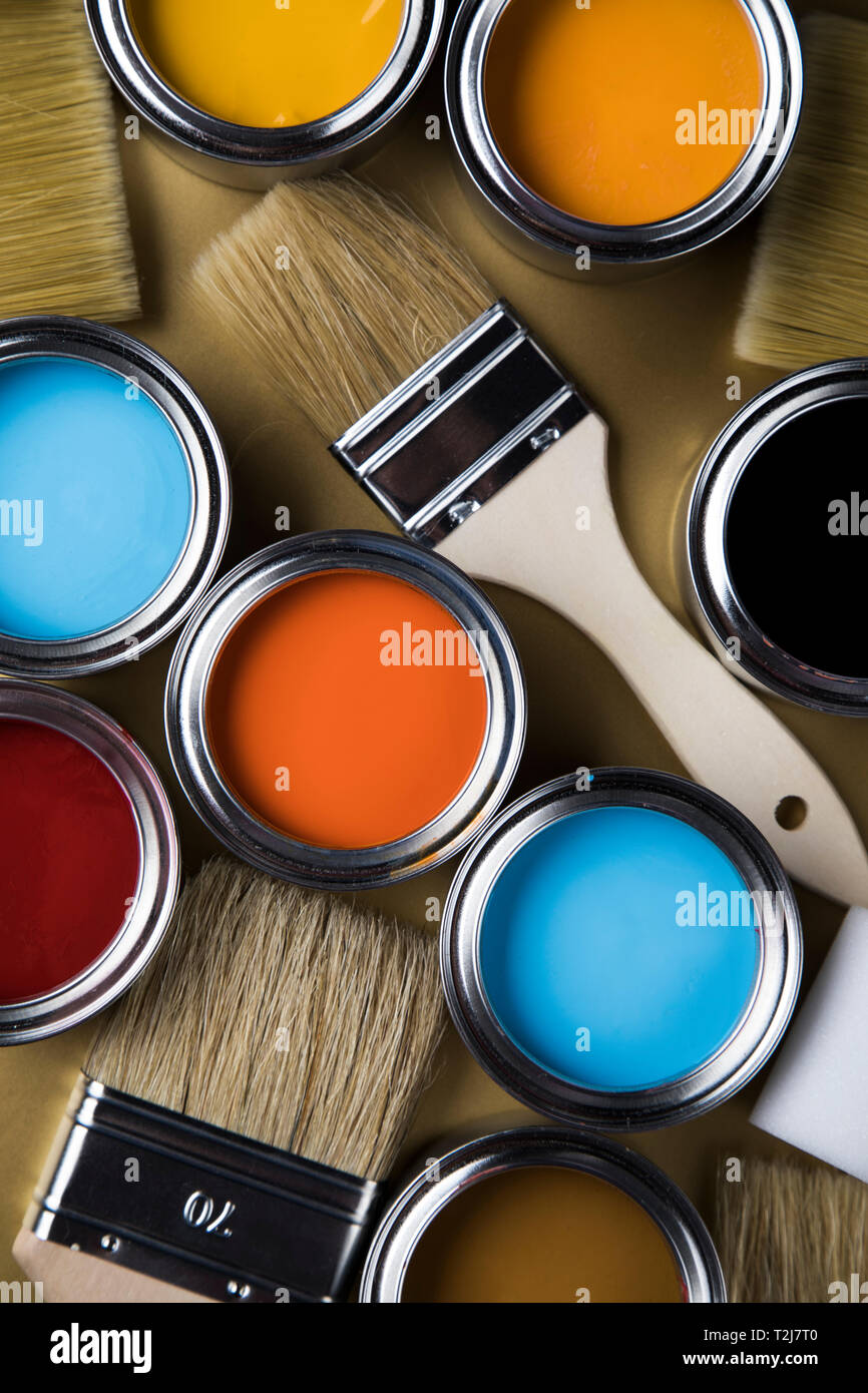 Tin cans with paint, brushes and bright palette of colors Stock Photo ...