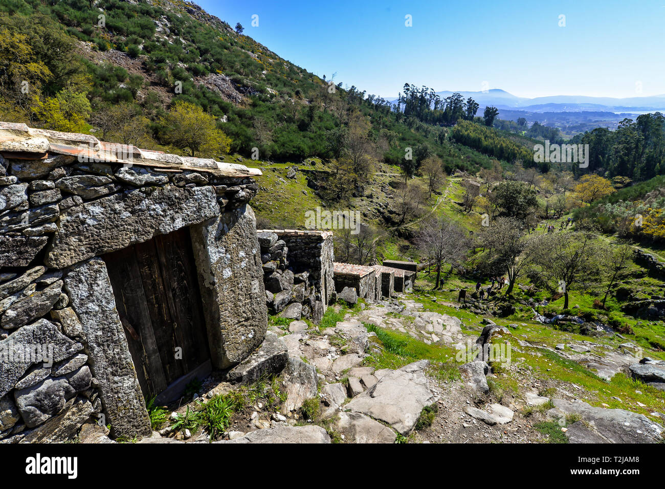 Water mills scattered through the hills in northwestern Spain on the ...