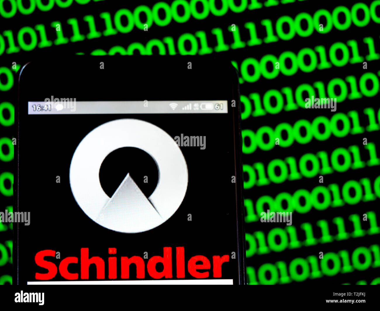 In this photo illustration a Schindler Group logo seen displayed on a ...