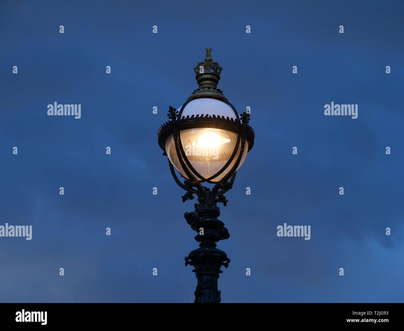 A traditional and heritage lamp light switches on when the sky darkens ...