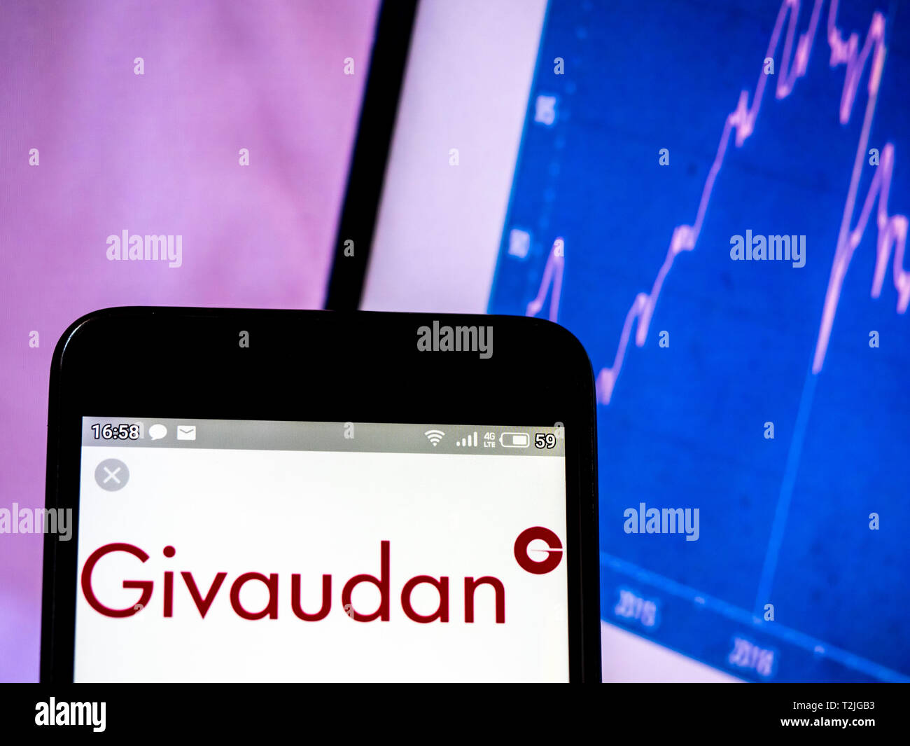 In this photo illustration a Givaudan SA logo seen displayed on a smart ...