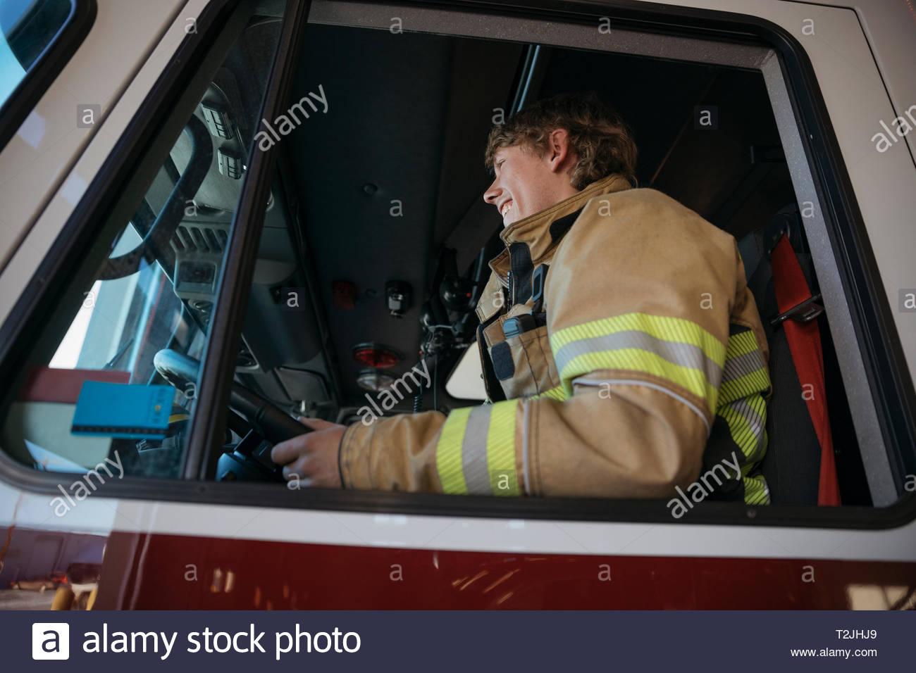 Driving fire engine hi-res stock photography and images - Alamy