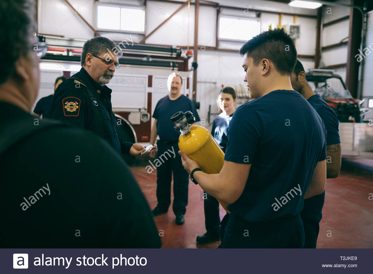 Firefighter fire station hi-res stock photography and images - Alamy