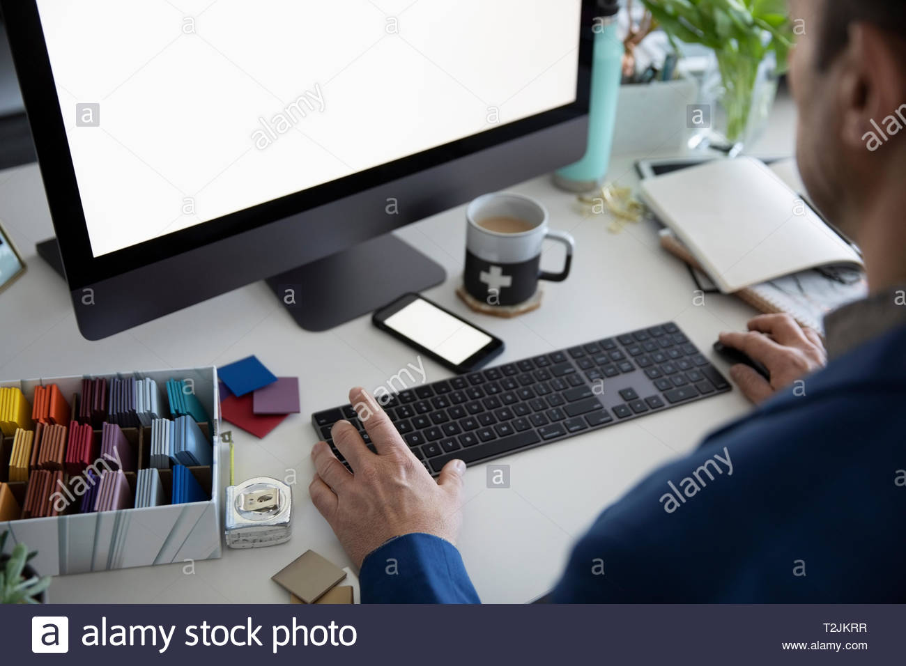 Watching over shoulder working hi-res stock photography and images - Alamy