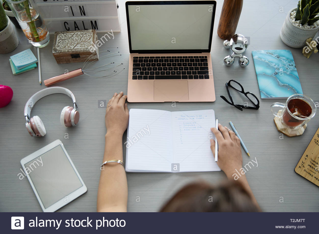 Creative businesswoman working at zen desk Stock Photo - Alamy
