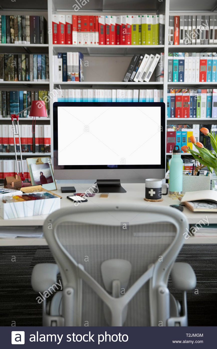 Computer on desk in interior design home office Stock Photo - Alamy