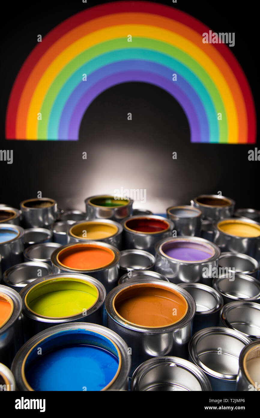 Rainbow, tin metal cans with color paint Stock Photo - Alamy