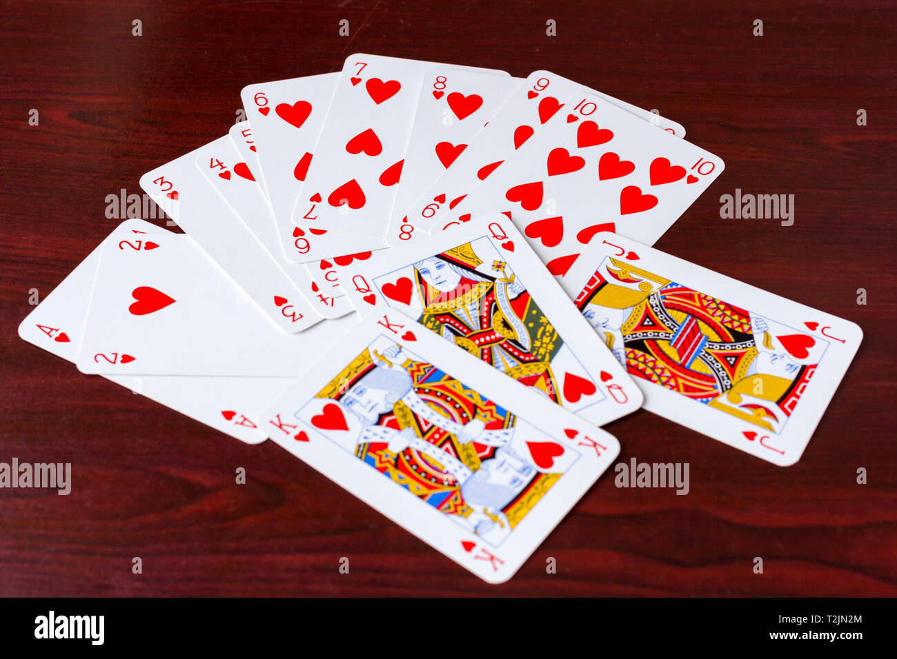 Scattered playing cards hi-res stock photography and images - Alamy