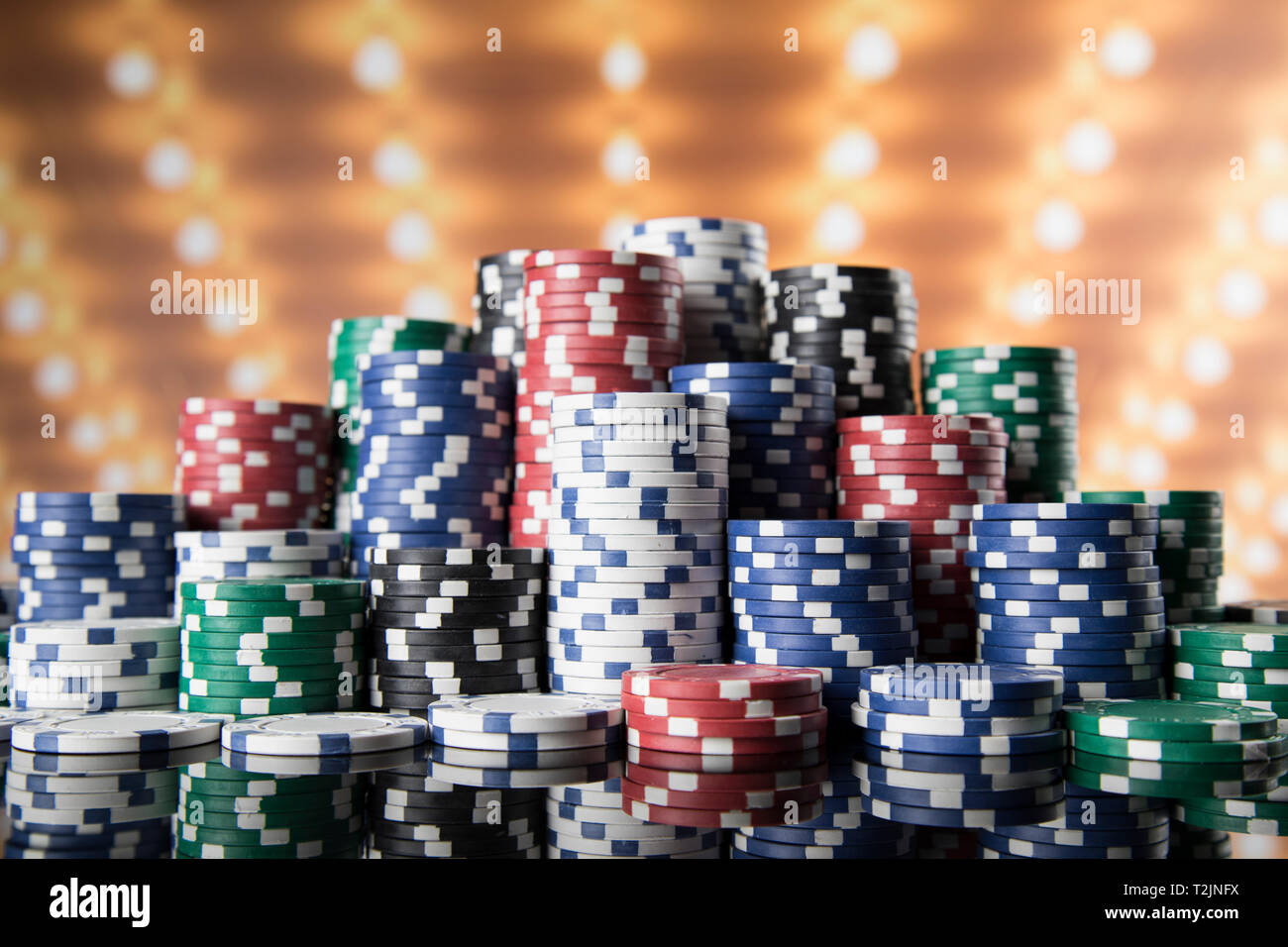 Poker Chips on gaming table Stock Photo - Alamy