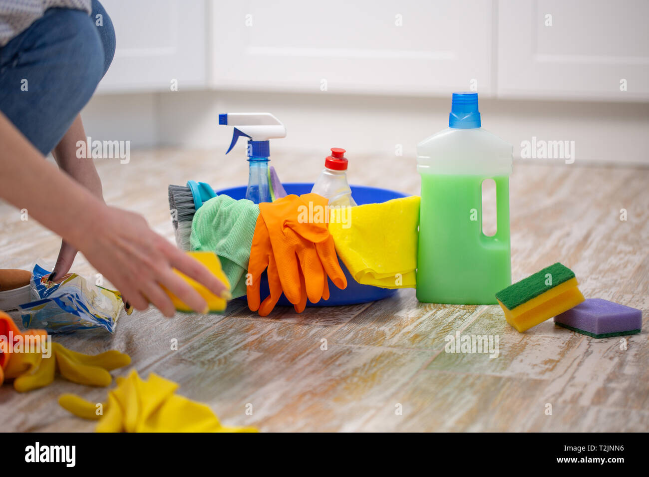Cleaning concept with supplies at kitchen background. spring cleaning ...