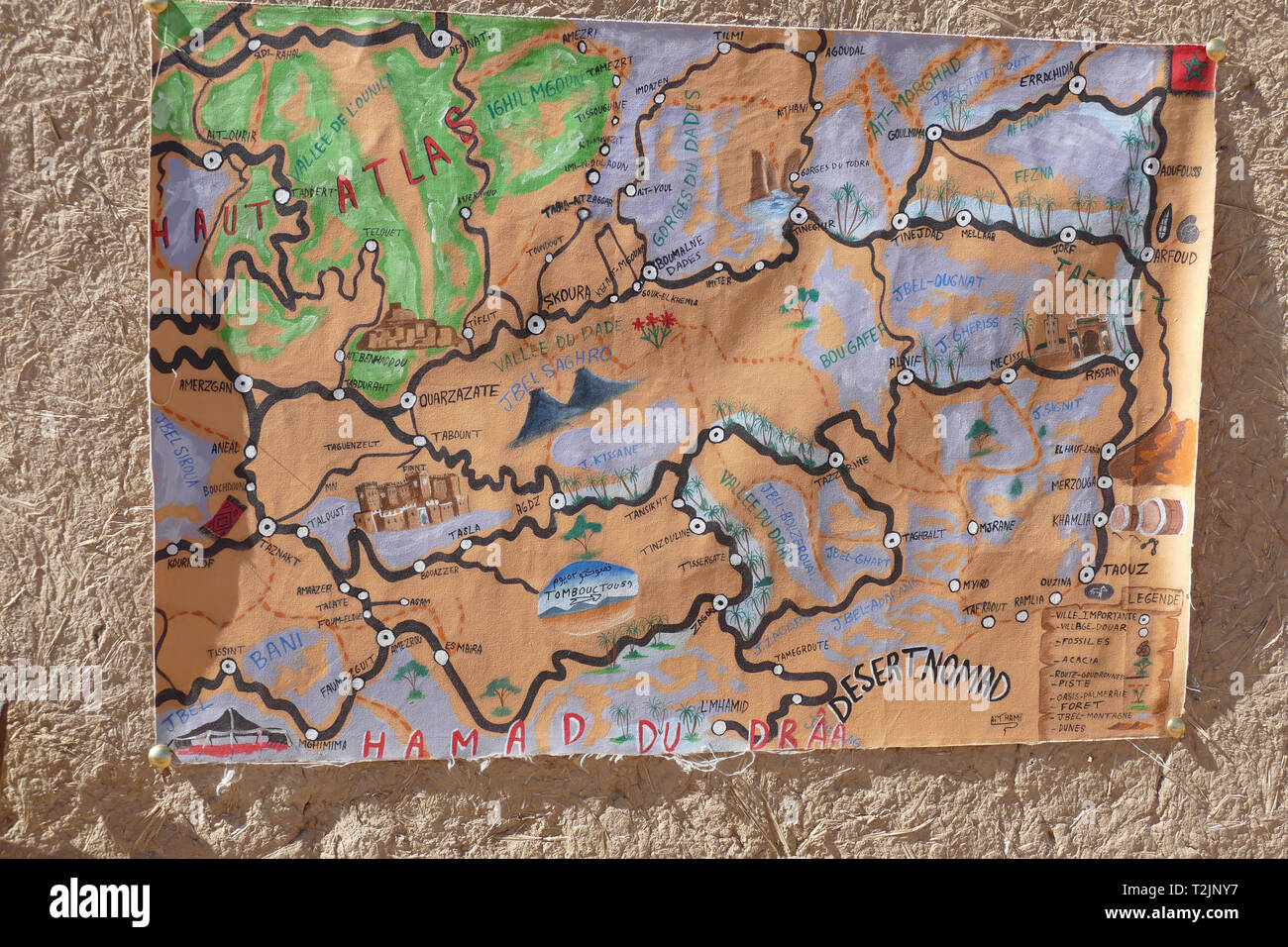 RISSANI, MOROCCO - FEB 15, 2019 - Painted map of the Moroccan Sahara ...