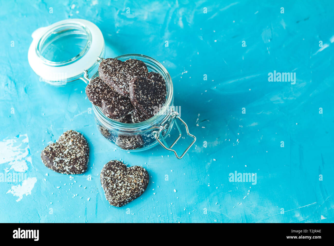 Delicious baked Heart shaped chocolate cookies with coconut chips in ...