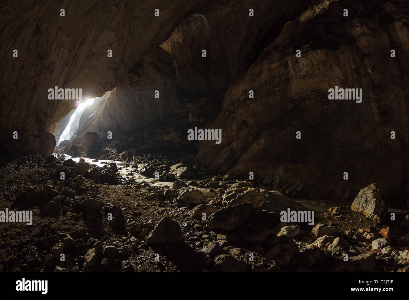 Ponicova cave entrance in the left bank of the Danube in Ciucaru Mare ...