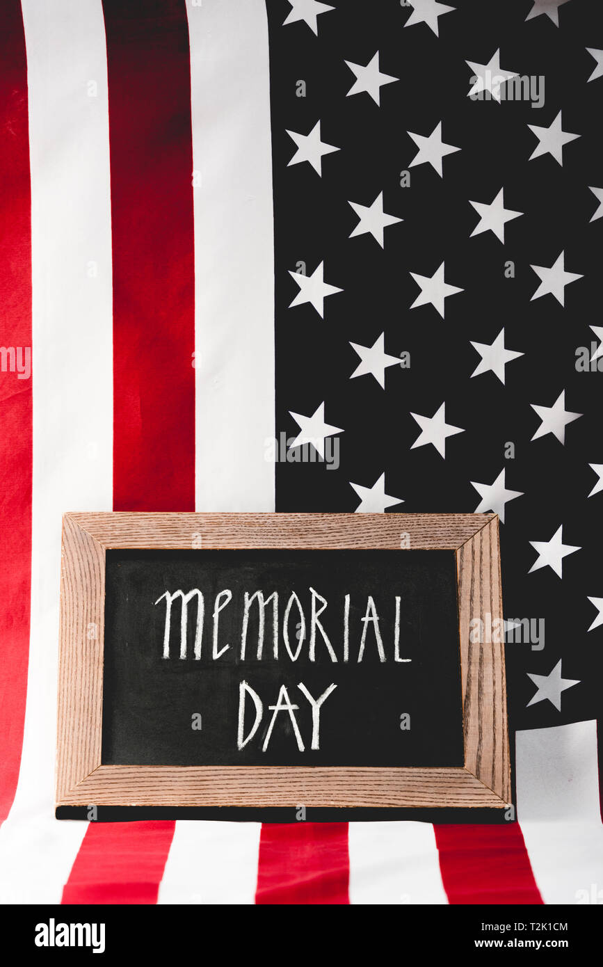 flag of memorial day lettering on chalkboard near america with stars ...