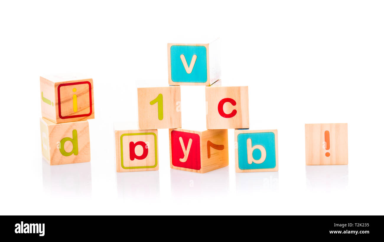Toy cubes. Baby collection. ABC letters made from baby toys Stock Photo ...