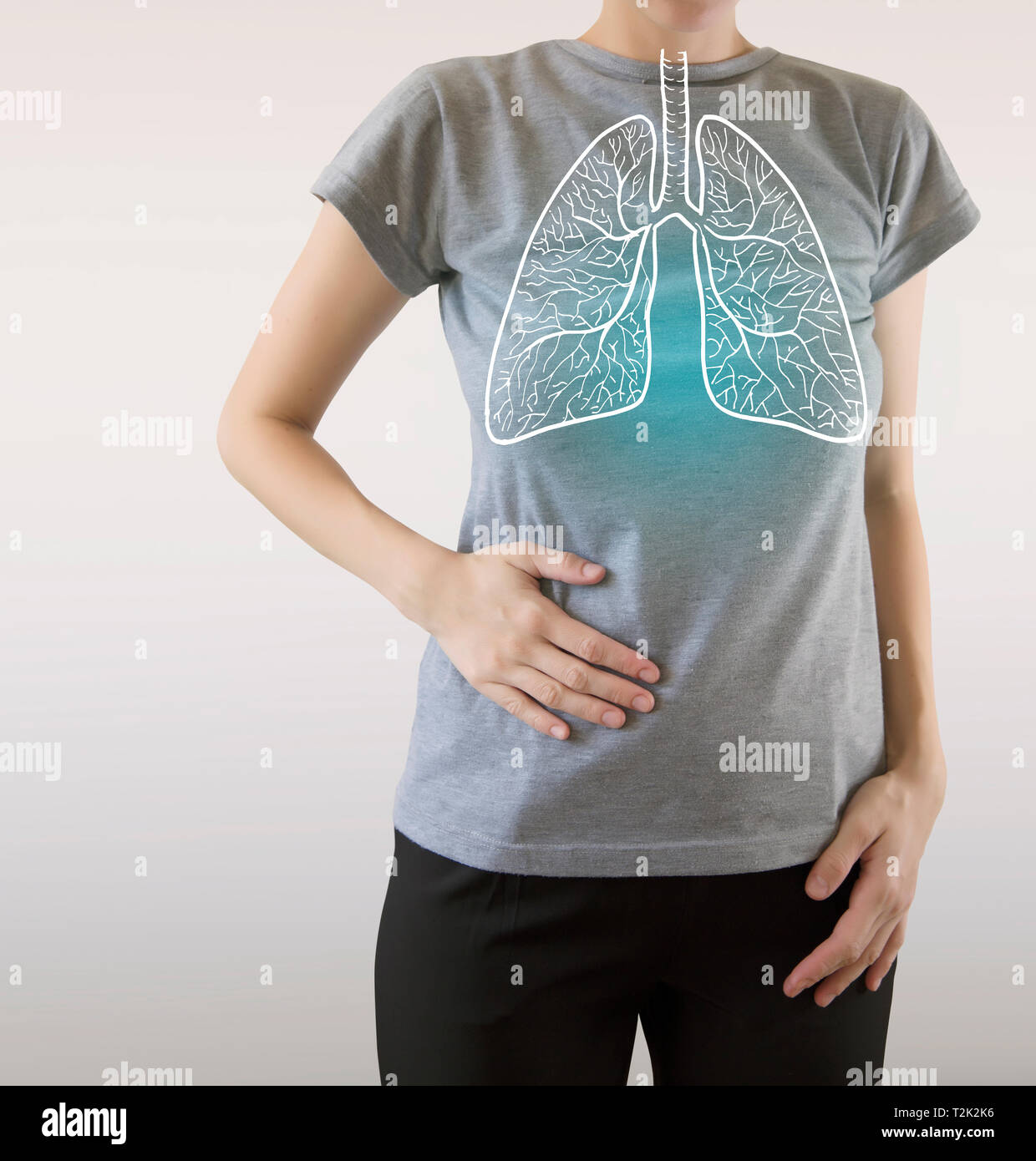 highlighted blue healthy lungs on woman body Stock Photo - Alamy