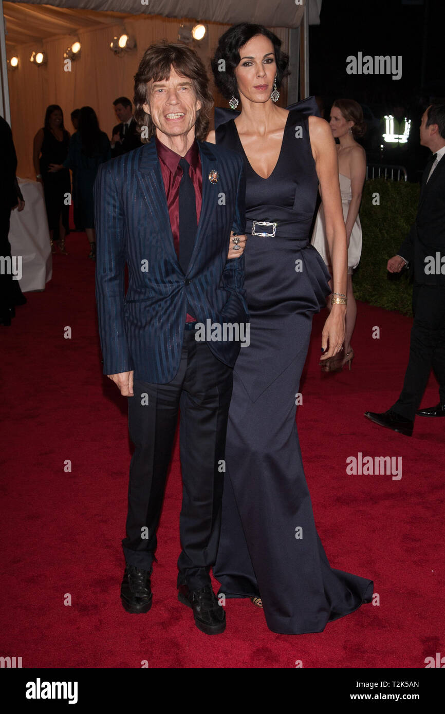 L'Wren Scott and Mick Jagger attend the 'Schiaparelli And Prada ...