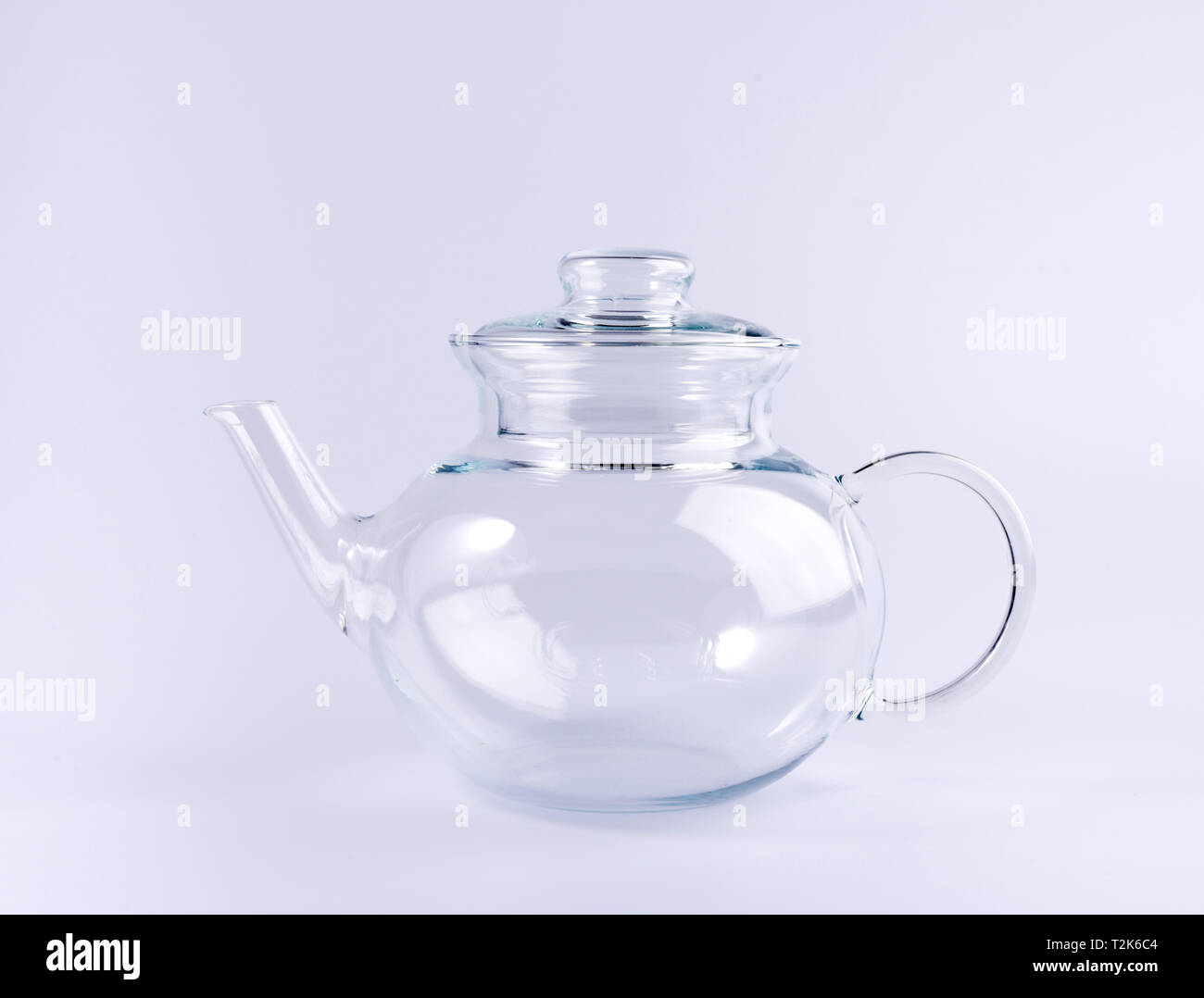 empty transparent teapot isolated on white background Stock Photo - Alamy