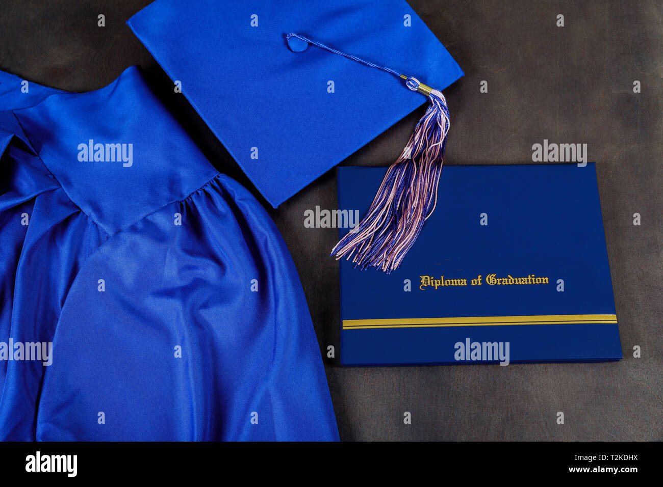 Top view of graduation cap, hat with degree paper certificate ...