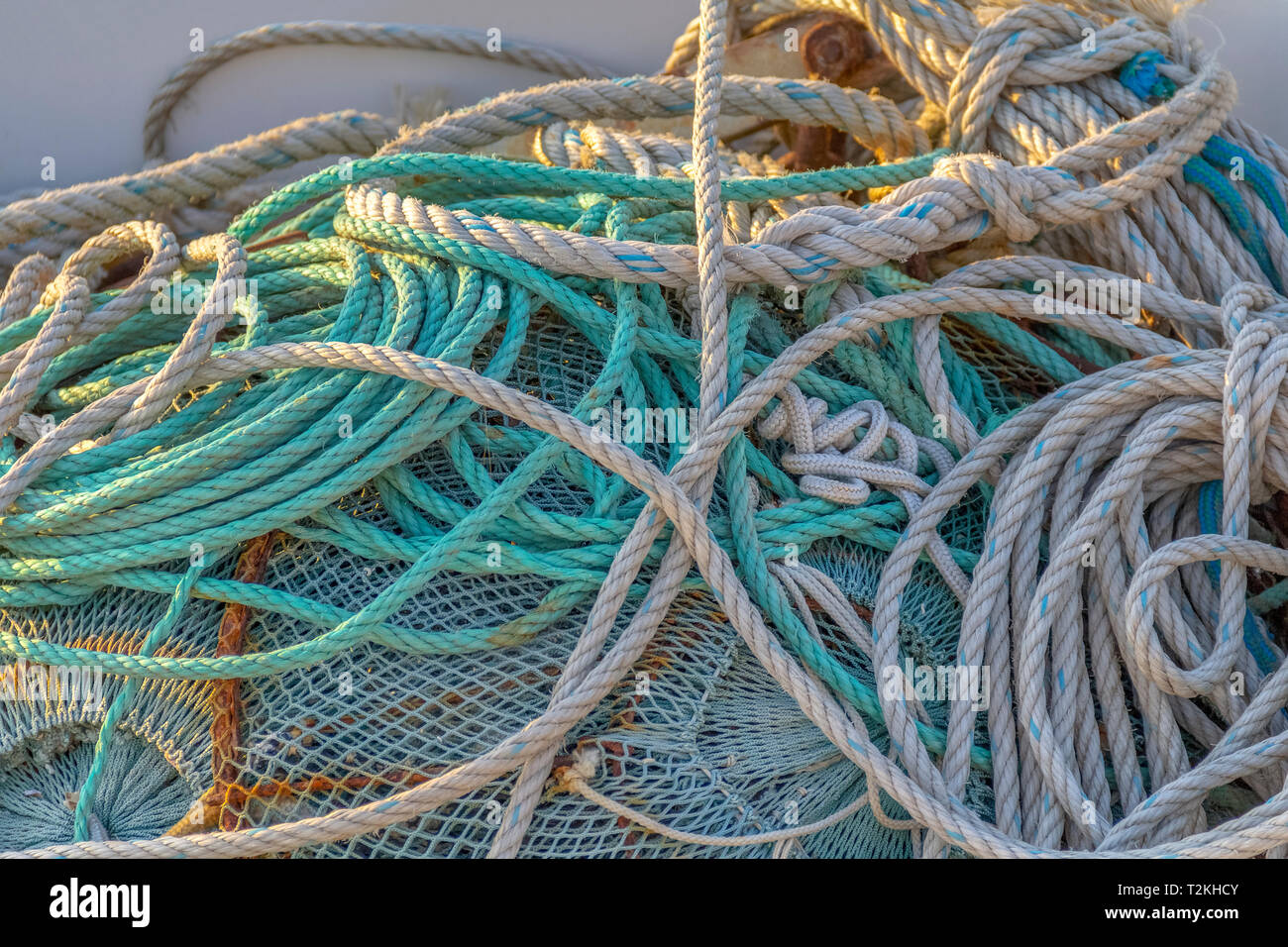 full frame picture showing a tangled fishing net Stock Photo - Alamy